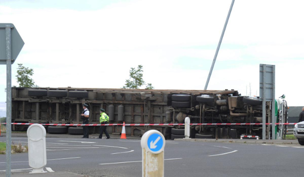 Driver seriously injured after lorry overturns at Derry airport ...