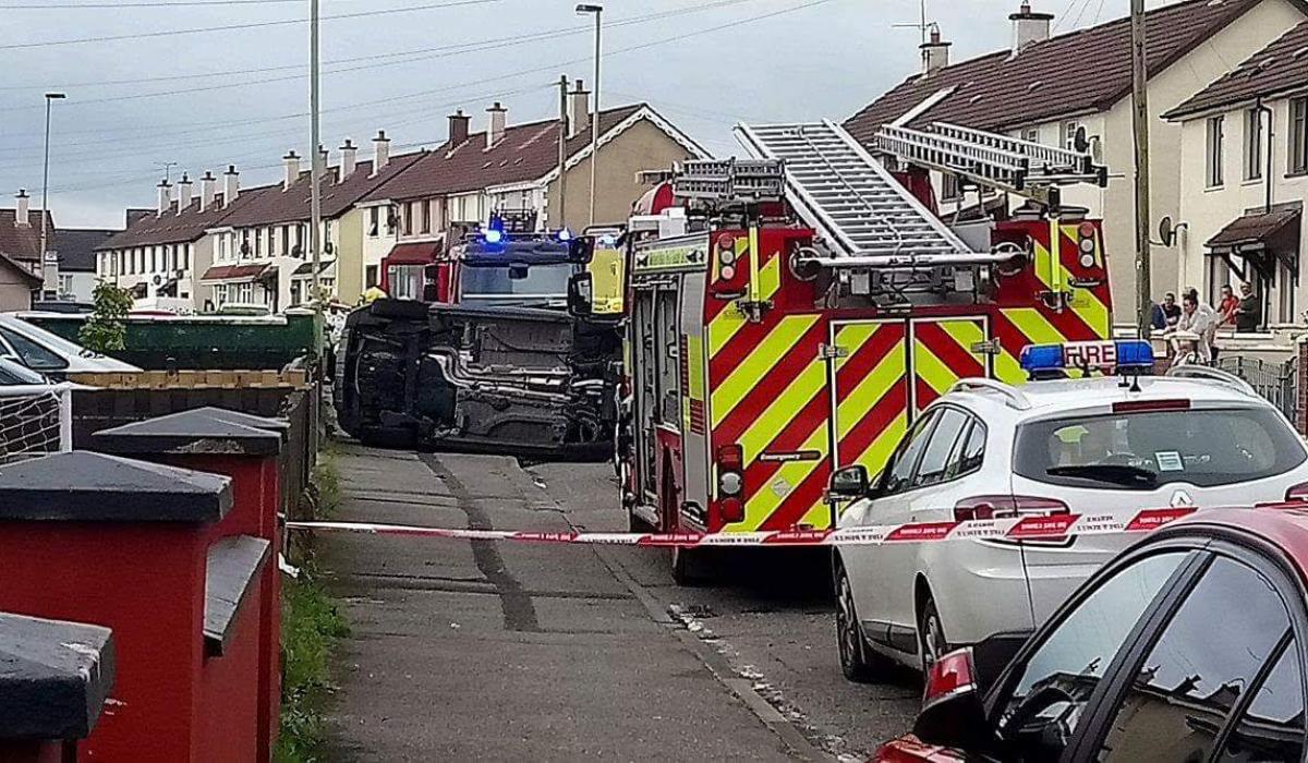 Woman cut out of car as police, fire service and ambulance attend ...