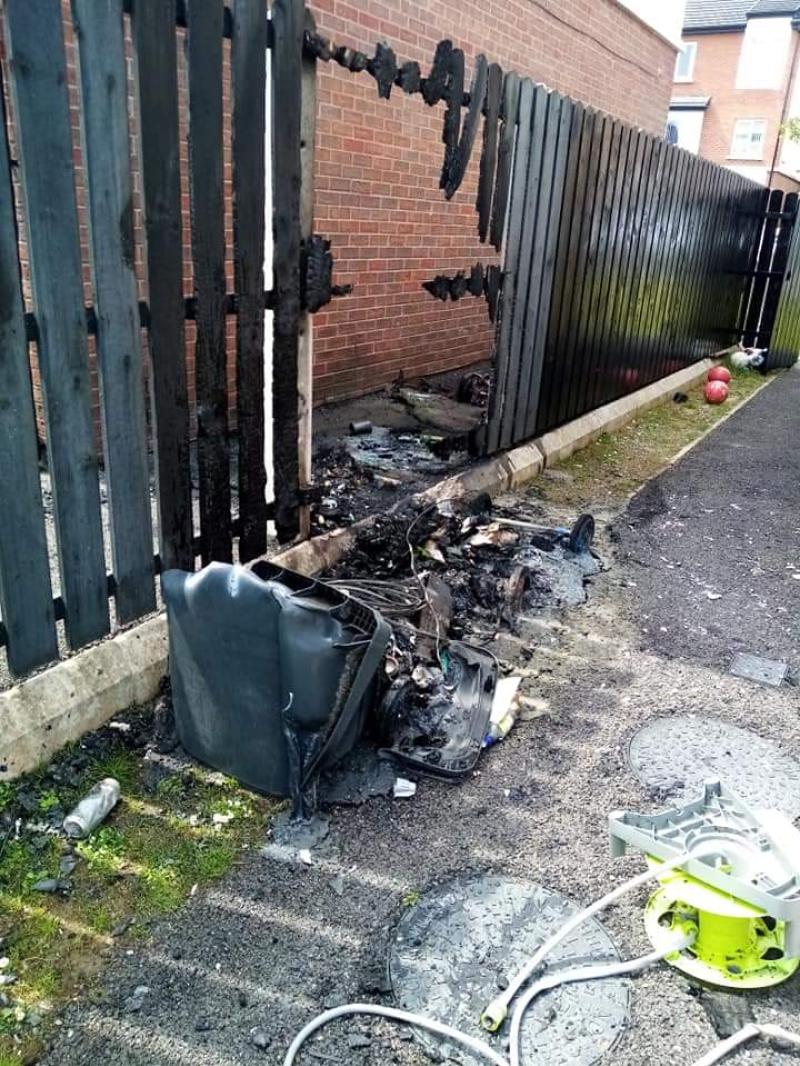Bins set on fire beside a house in Derry's Creggan estate - Derry Now