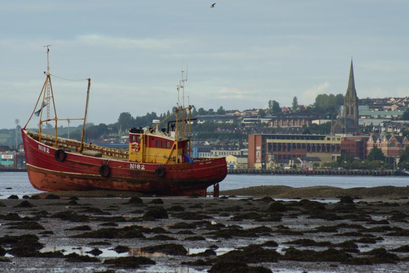 It's still there: High tide fails to refloat boat which has been stuck ...